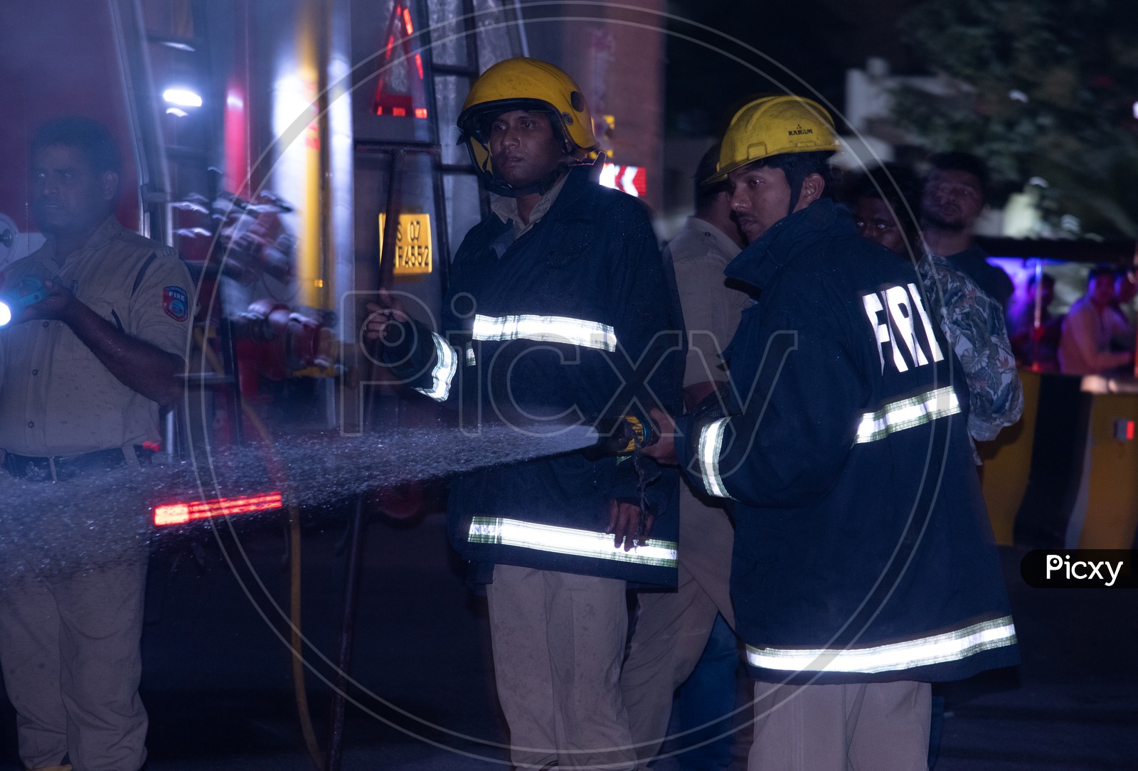 Image of Fire man Fighting to take control over a Fire Mishap..TS DR&F ...