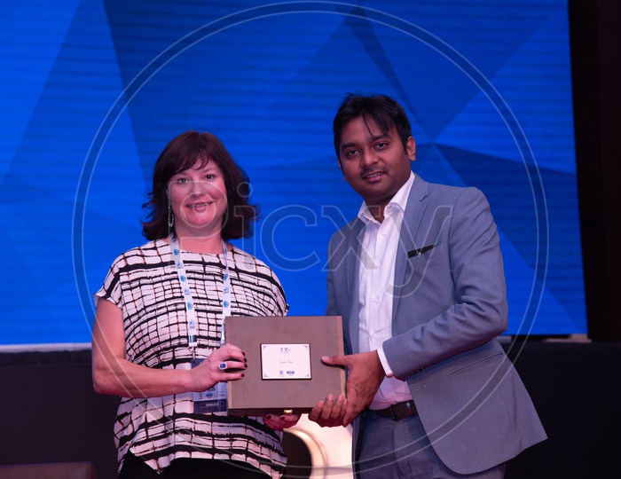 Image of Winny Patro, CEO, APIS with a Fin Tech delegate-ZB695630-Picxy