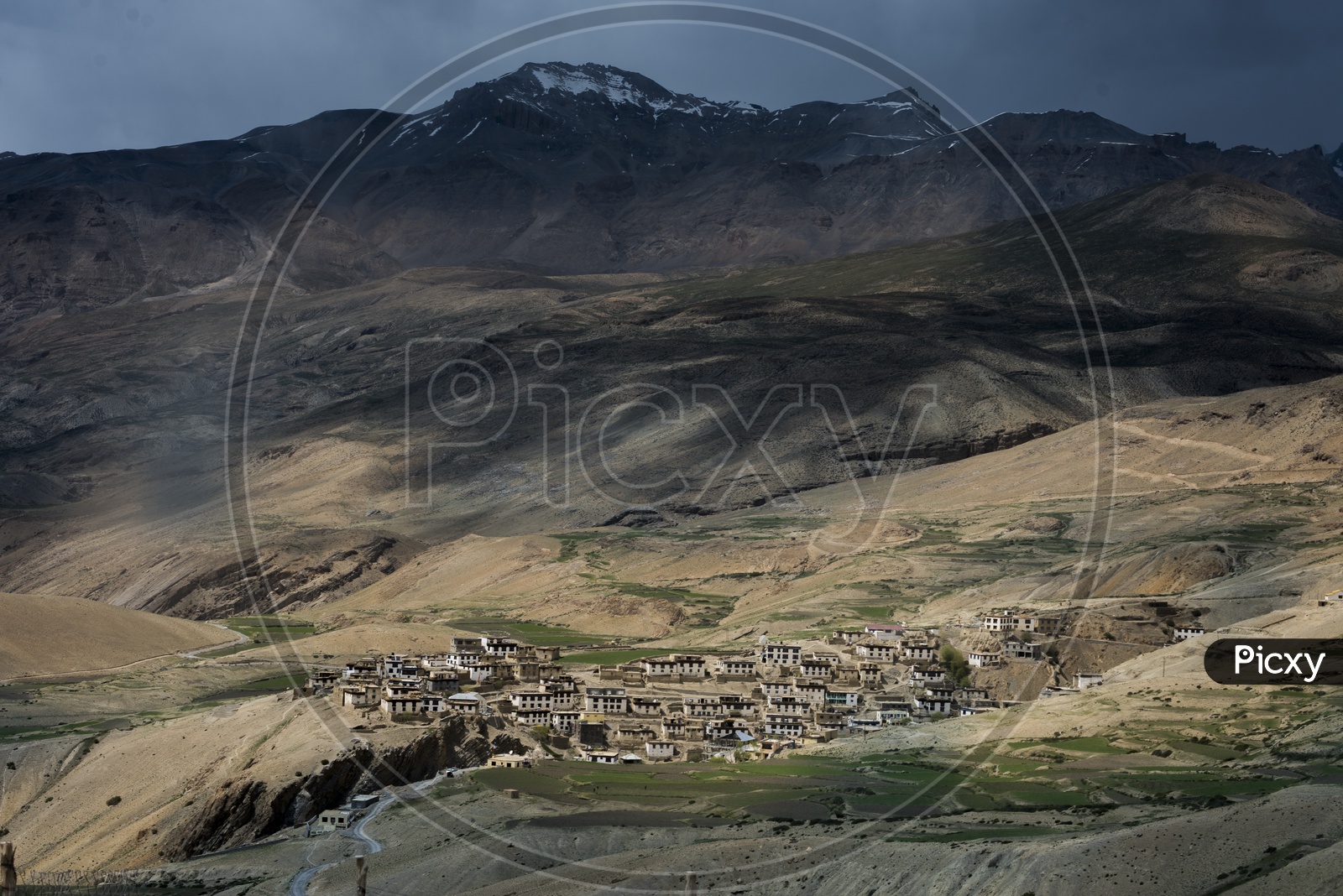 Image of Tiny Village between Snow Mountains at Spiti Valley, Marango ...