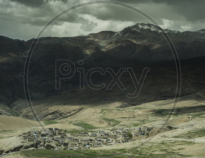 Image of Tiny Village between Snow Mountains at Spiti Valley, Marango ...