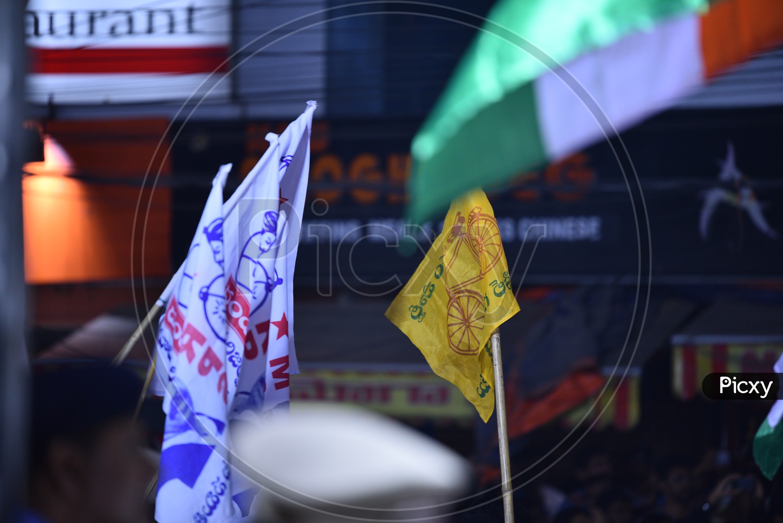 Image of Placards & Flags Supporting TDP & Congress Party at a meeting ...