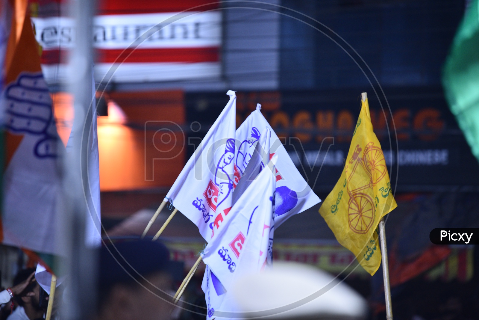 Image of Placards & Flags Supporting TDP & Congress Party at a meeting ...