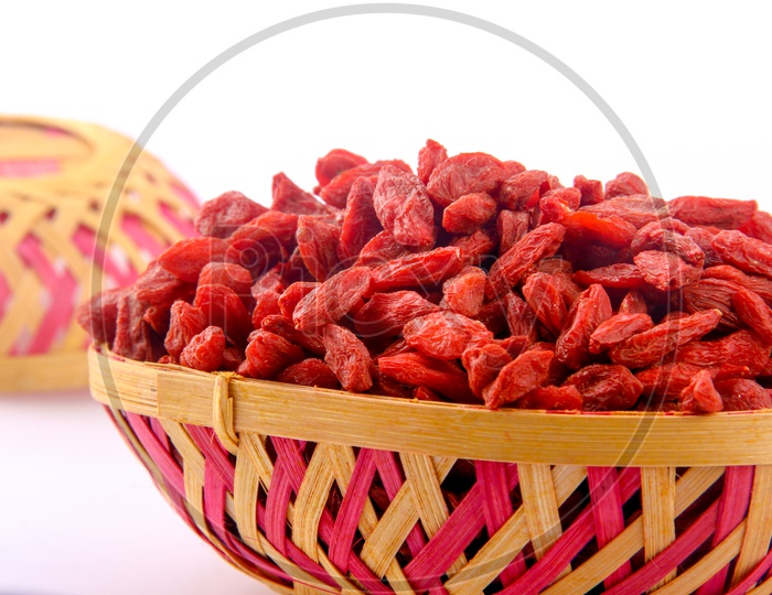 Image of Dried Red Raisin In a Bowl on an Isolated White Back Ground ...