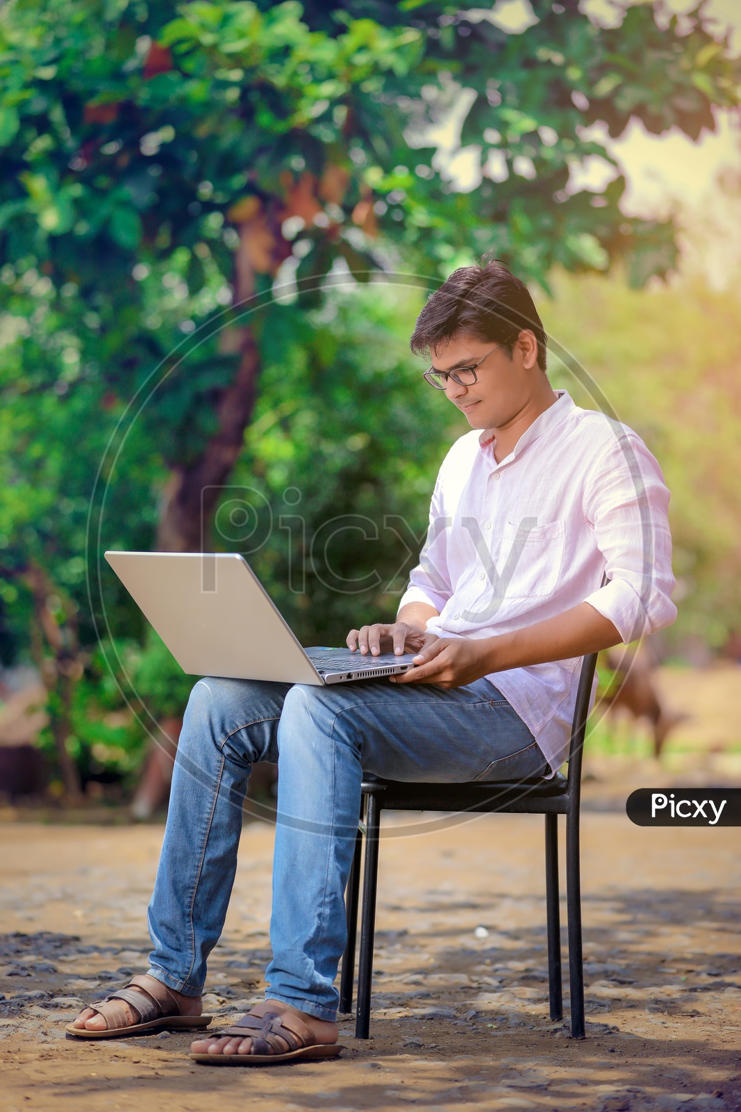 Image of Indian College Student using Laptop-VA348793-Picxy