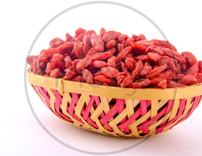 Image of Dried Red Raisin In a Bowl on an Isolated White Back Ground ...