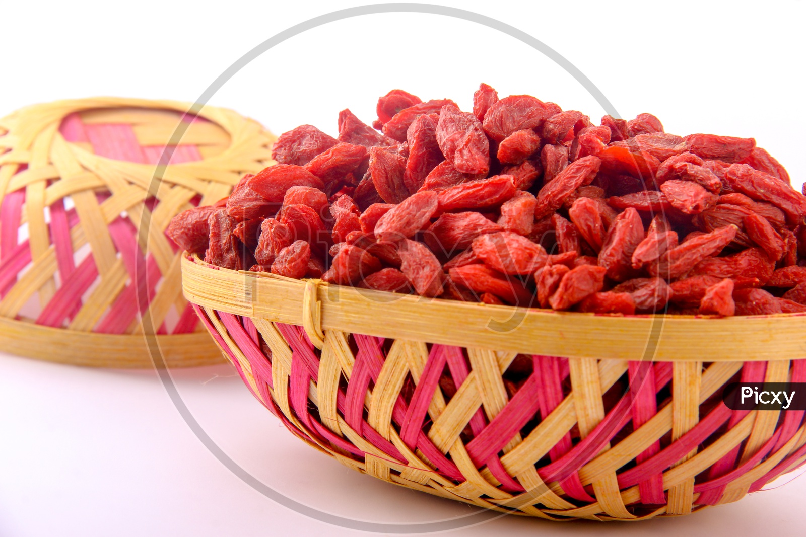 Image of Dried Red Raisin In a Bowl on an Isolated White Back Ground ...