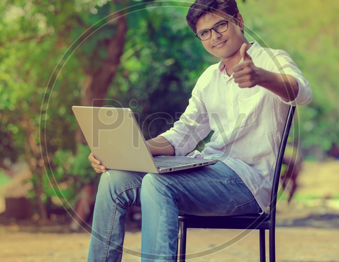 Image of Indian College Student using Laptop-ET332421-Picxy