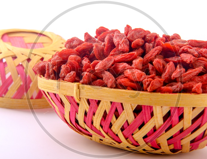 Image of Dried Red Raisin In a Bowl on an Isolated White Back Ground ...