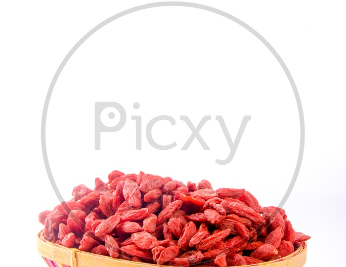 Image of Dried Red Raisin In a Bowl on an Isolated White Back Ground ...