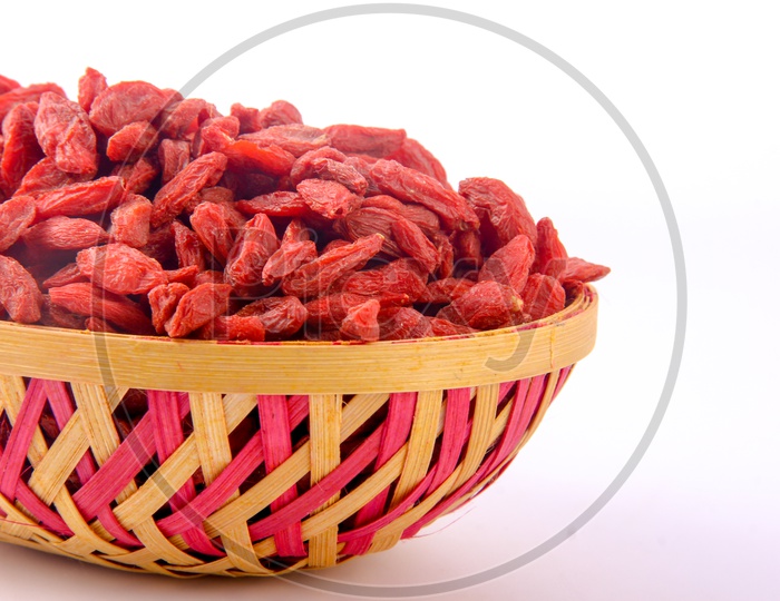 Image of Dried Red Raisin In a Bowl on an Isolated White Back Ground ...