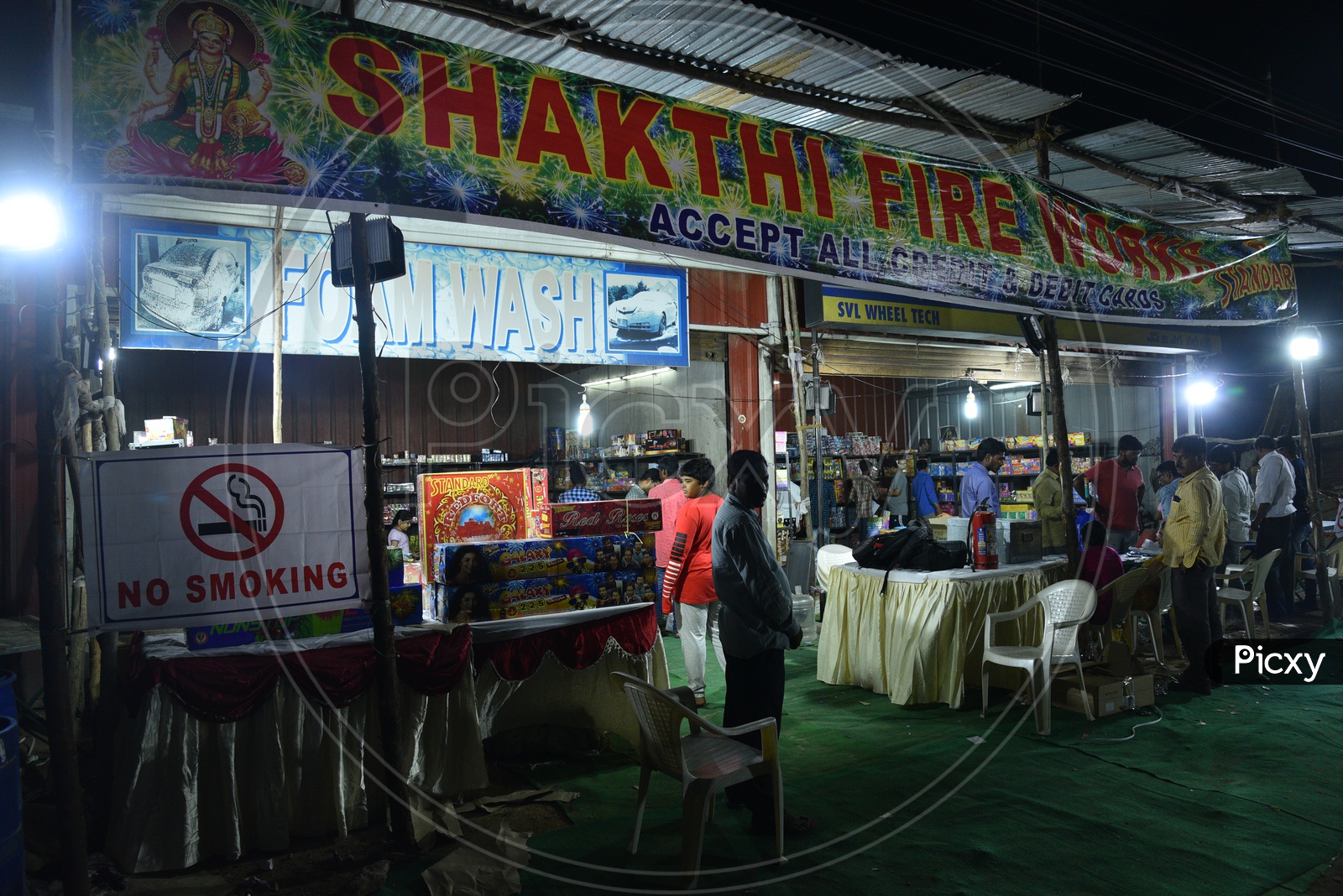 Image of No Smoking Poster In front of Firecrackers Shop-QE677348-Picxy