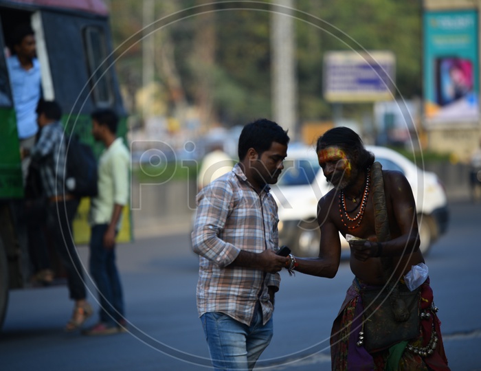 Image of People dress up like Pothu Raju( A historic face in Telangana ...