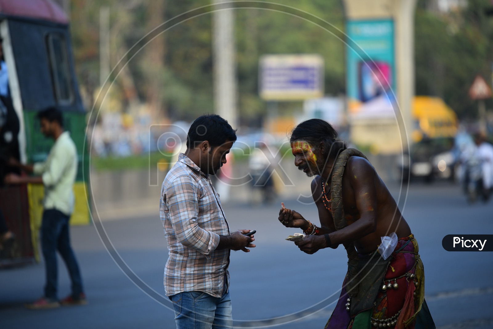Image of beggars dress up as pothuraju and beg on streets-TA858101-Picxy