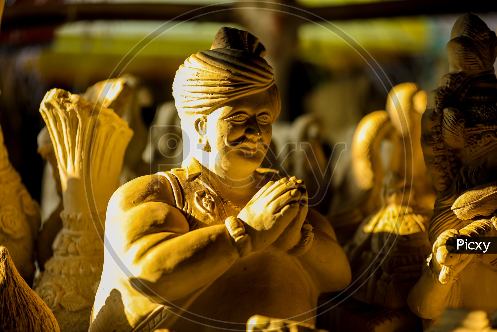 Image of Indian Man Namaste Statue-FB218730-Picxy