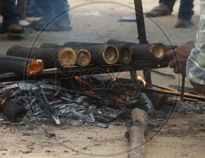 Image of Cooking Chicken in Wooden Blocks.-RV214373-Picxy