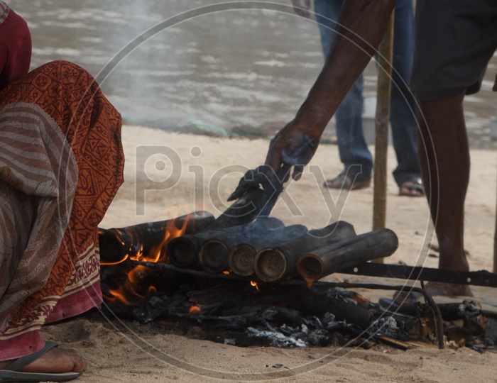 Image of Cooking Chicken in Wooden Blocks.-RV214373-Picxy