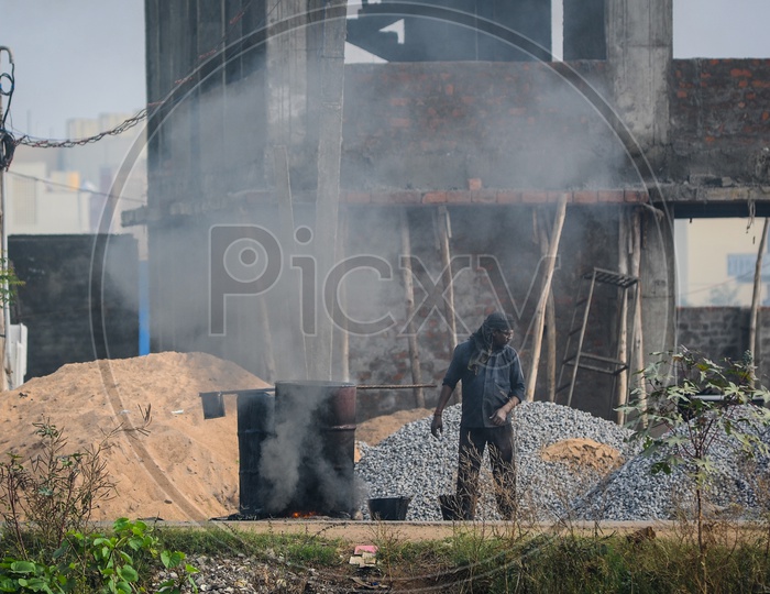 Image of Preparing Tar for new road-OT118481-Picxy