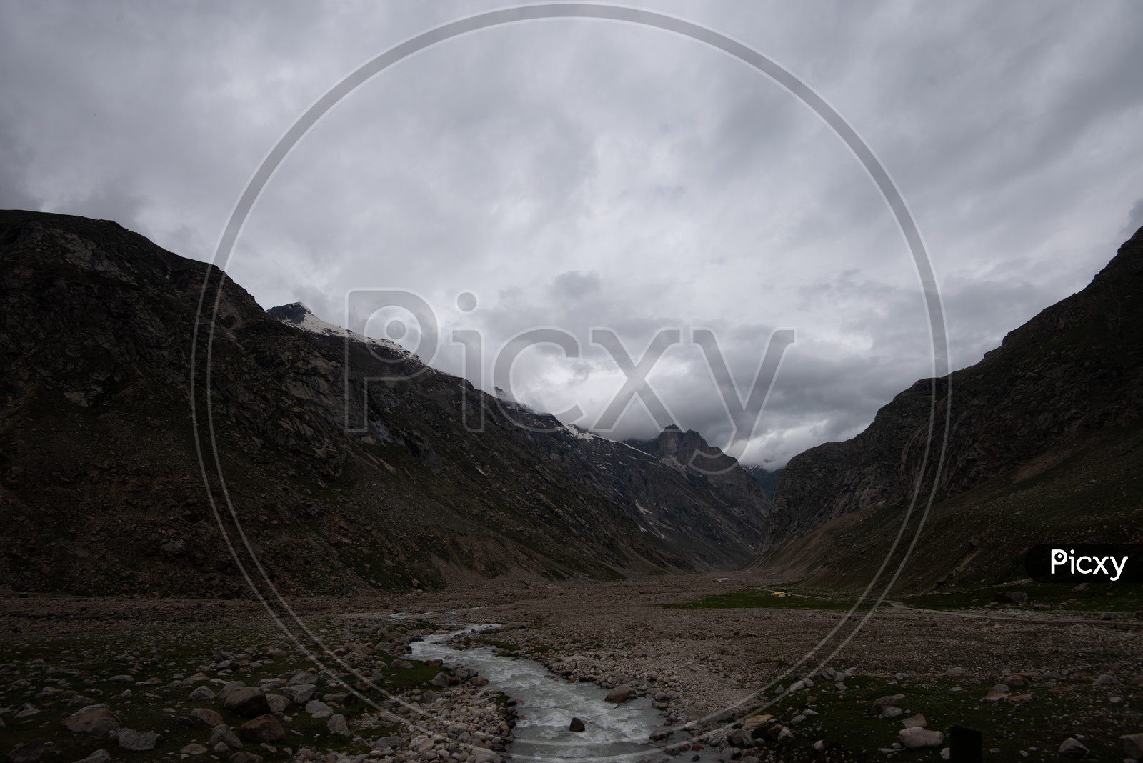 Image of A Dry River Valley in Mountains and Dunes Closing Up the Way ...