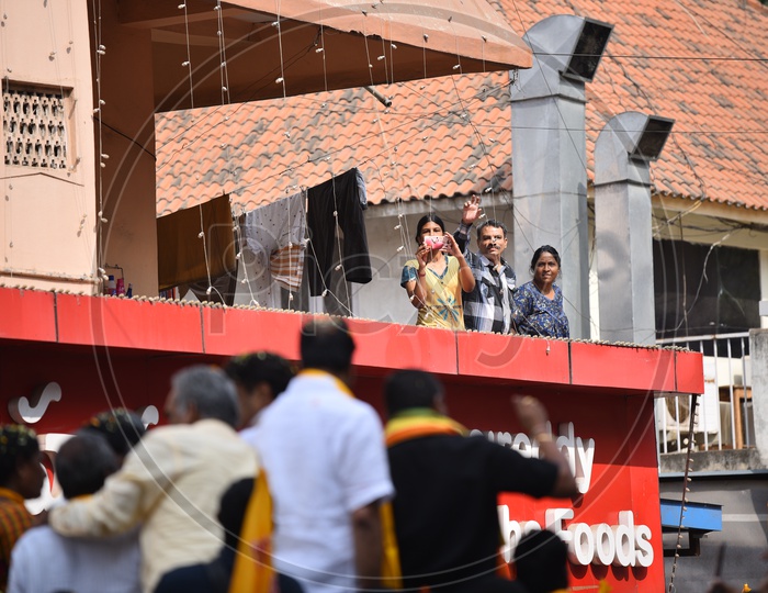 Image of Residents Capturing TDP Road Show in Their Mobiles-PC017695-Picxy