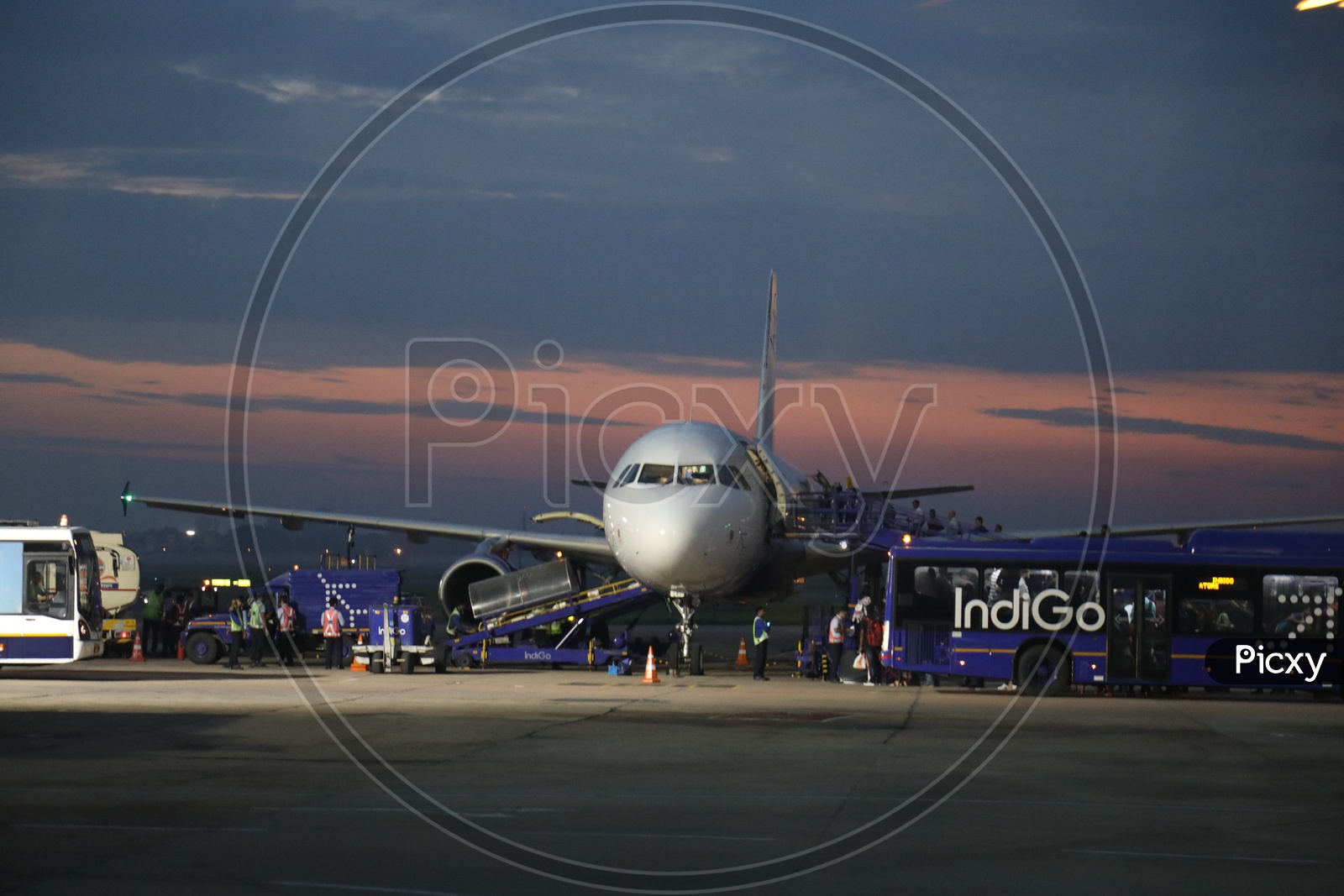 Image of Indigo Flight with Beautiful sunset in the background-SO743317 ...