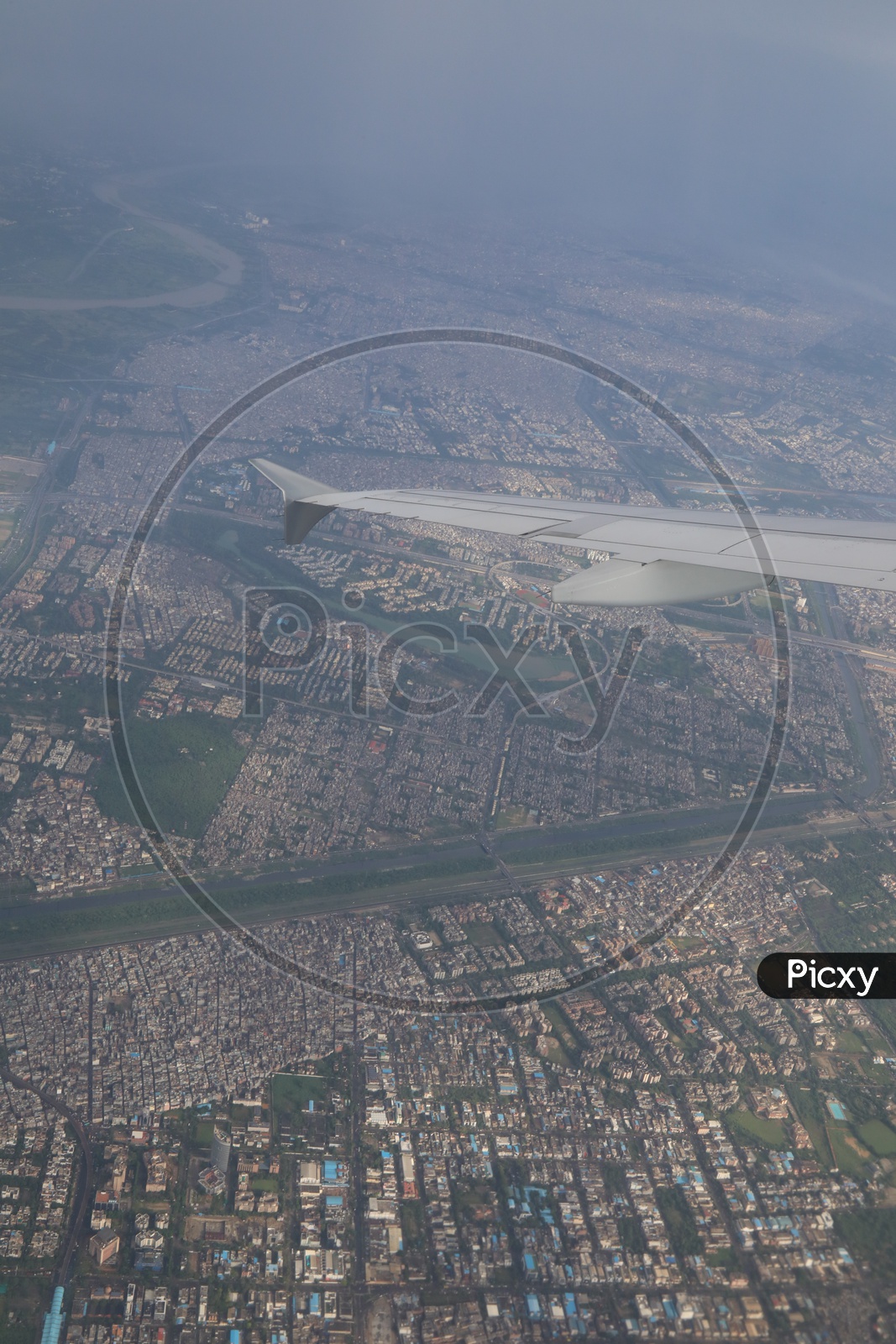 Image of aerial view of delhi through Flight window-FK624910-Picxy