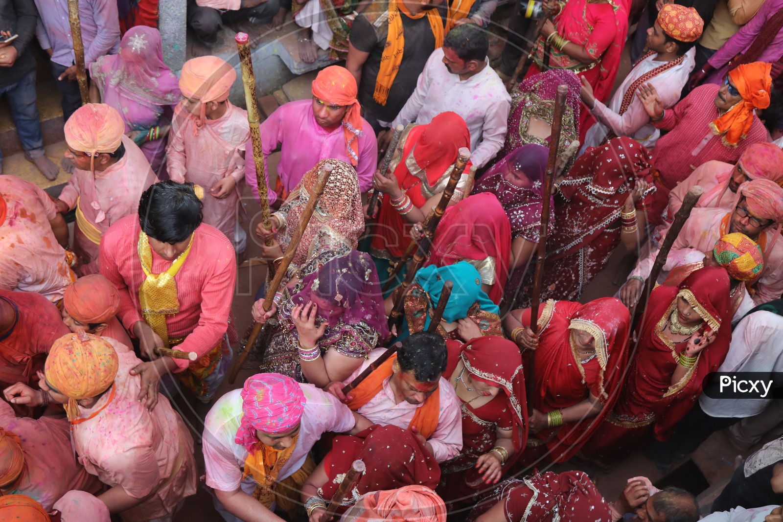 Image of Indian Hindu Devotees Celebrating Lathmar Holi By Women ...