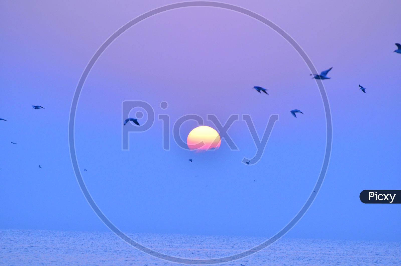 Image of A Beautiful View Of Sunset Over a Surya Lanka Beach With ...