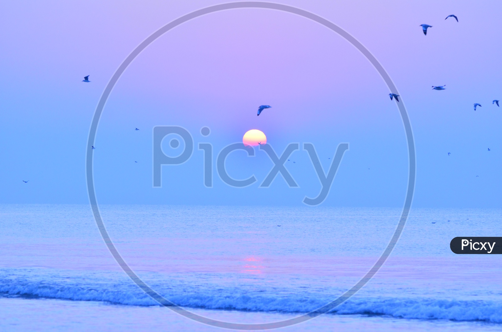Image of A Beautiful View Of Sunset Over a Surya Lanka Beach With ...