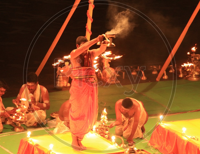 Image of Priests Performing Holy Harathi / Aarti in Rajahmundry for ...