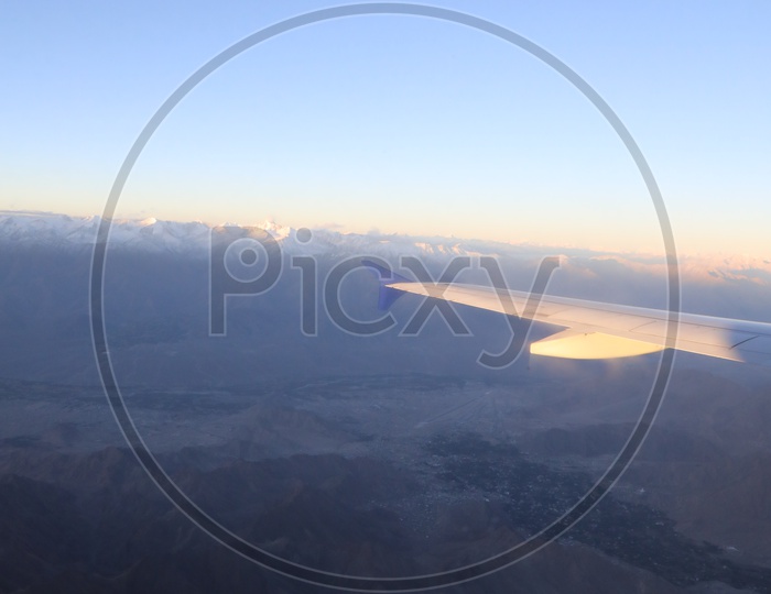 Image of Beautiful Landscape of Snow Capped Mountains from flight ...