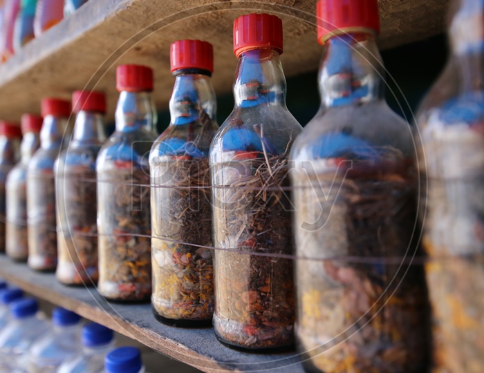 Image of Kerala Ayurvedic Bottles With Various Roots and Spices Closeup ...