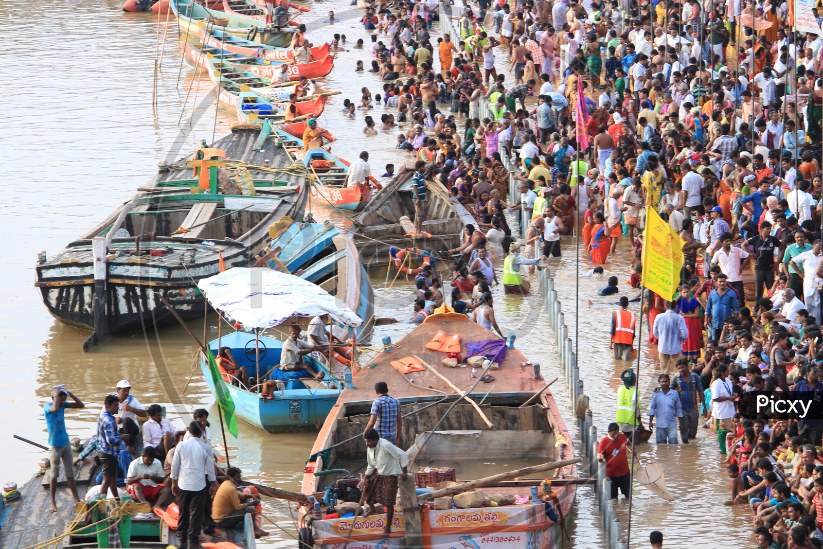 Image of Aerial View Of Pilgrims Taking Holy Bath In Godavari River In ...