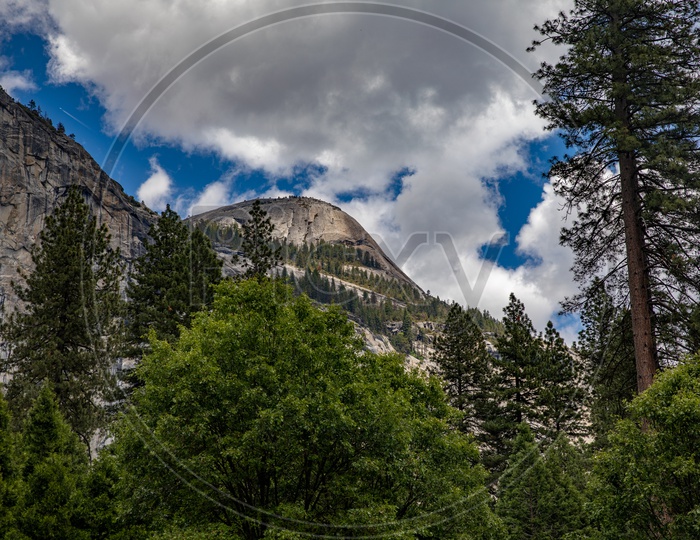 Image of A Beautiful View Of a Mountains With Sky and Clouds-WV596608-Picxy