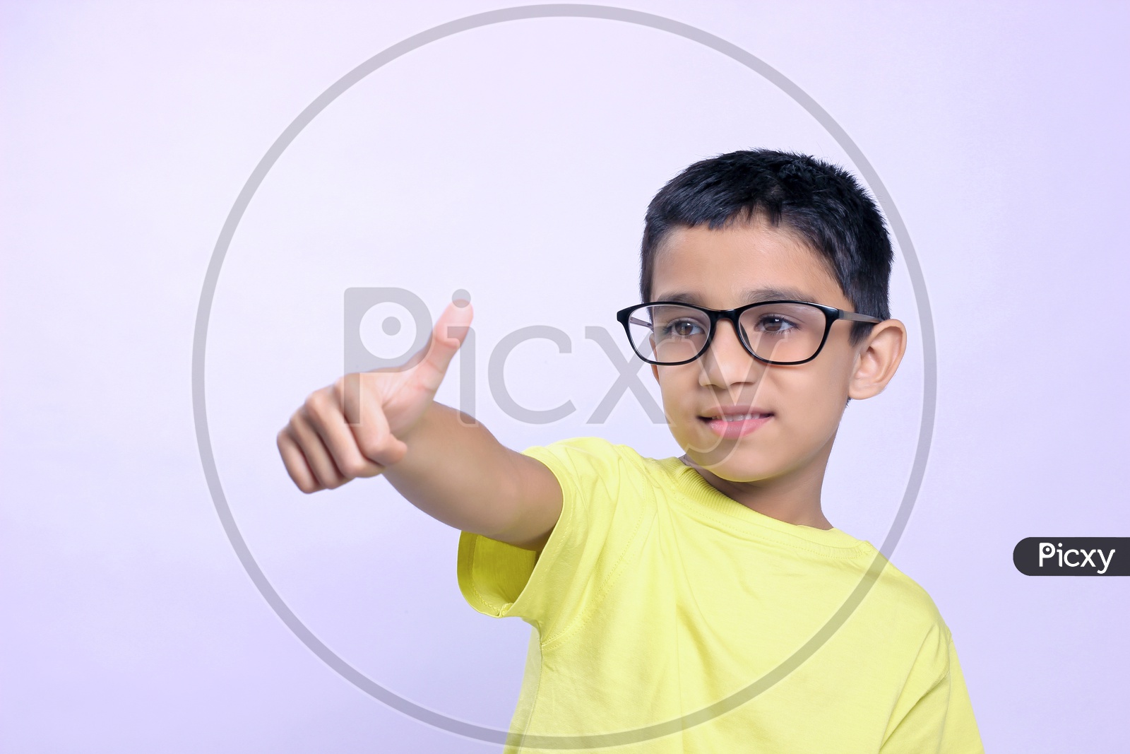 Image of Indian Child showing Thump up-RM170389-Picxy