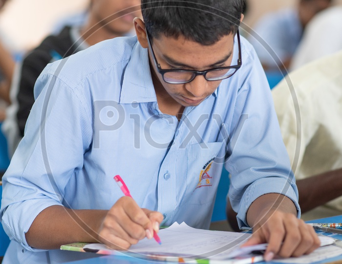 Image of Student writing exam at an educational institute in Telangana ...