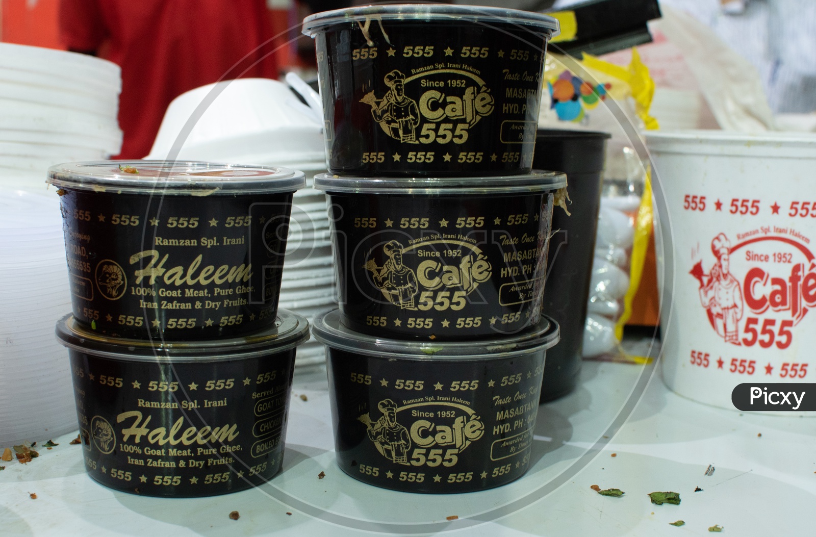 Image of Haleem packed in boxes at Cafe 555-IY565868-Picxy