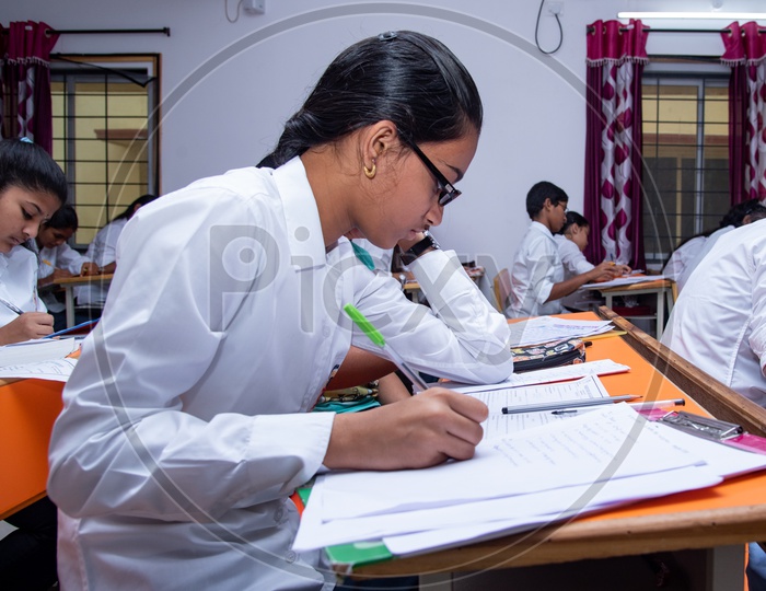 Image of Student writing exam in an educational institute in Telangana ...