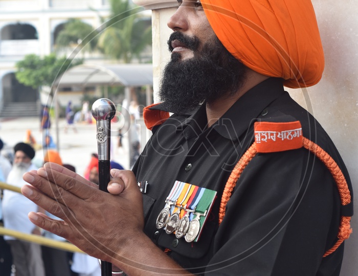 Image of Sikh Army Officer offering prayers-LO055110-Picxy