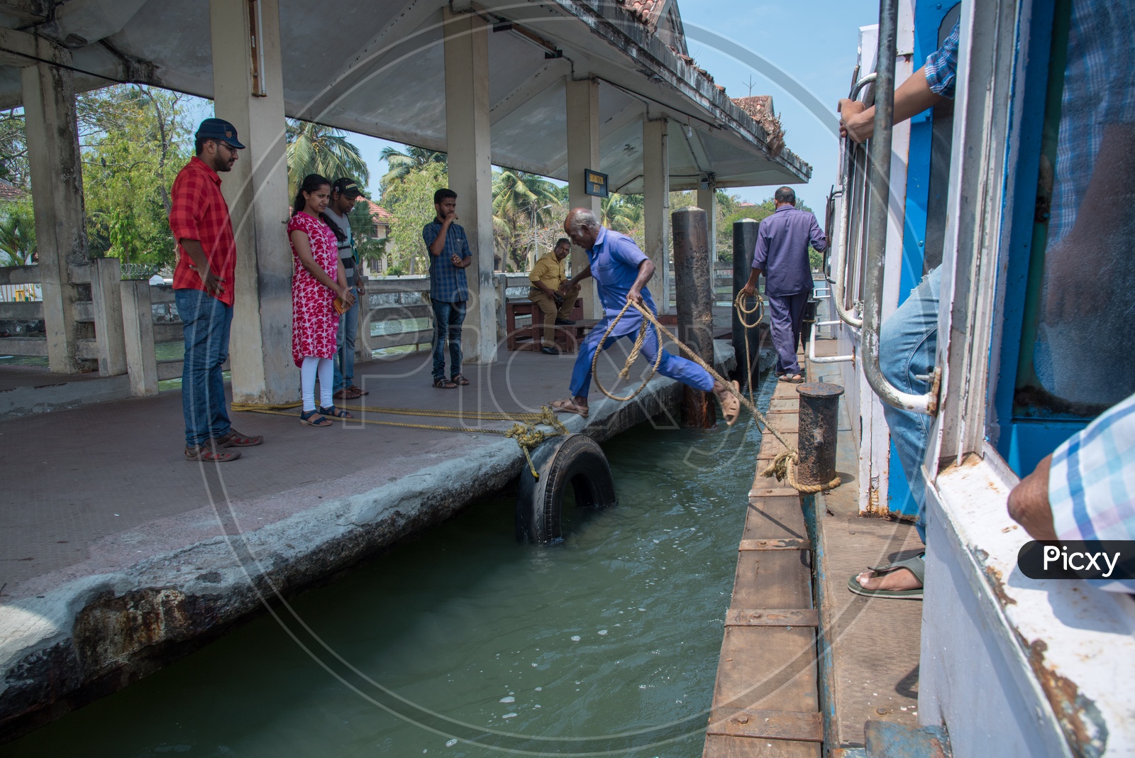 Image of Pulling the Boat towards Jetty, Fort Kochi ,Kerala.-QW262401-Picxy