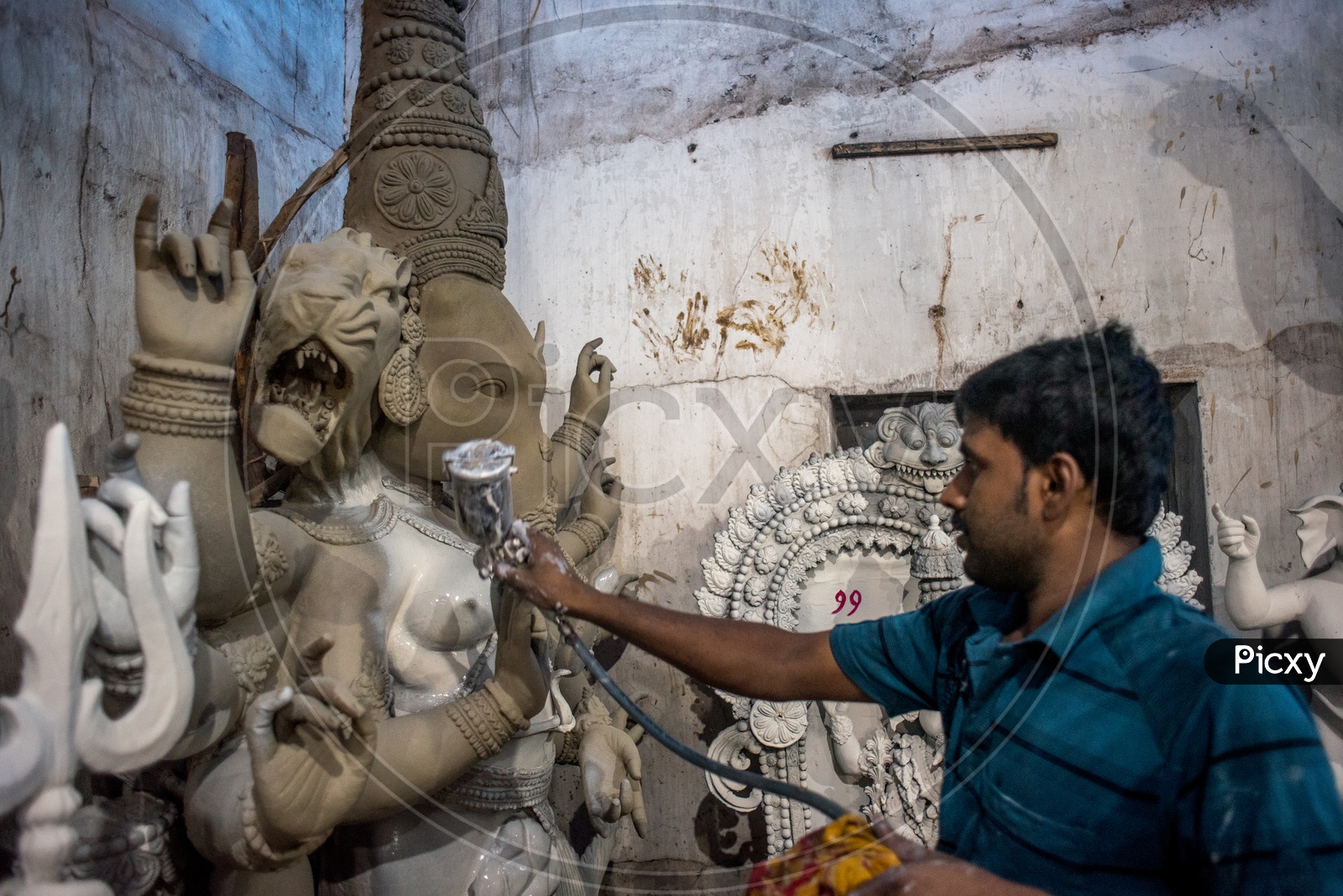 Image of Painting Ganesh Idols-SM488616-Picxy