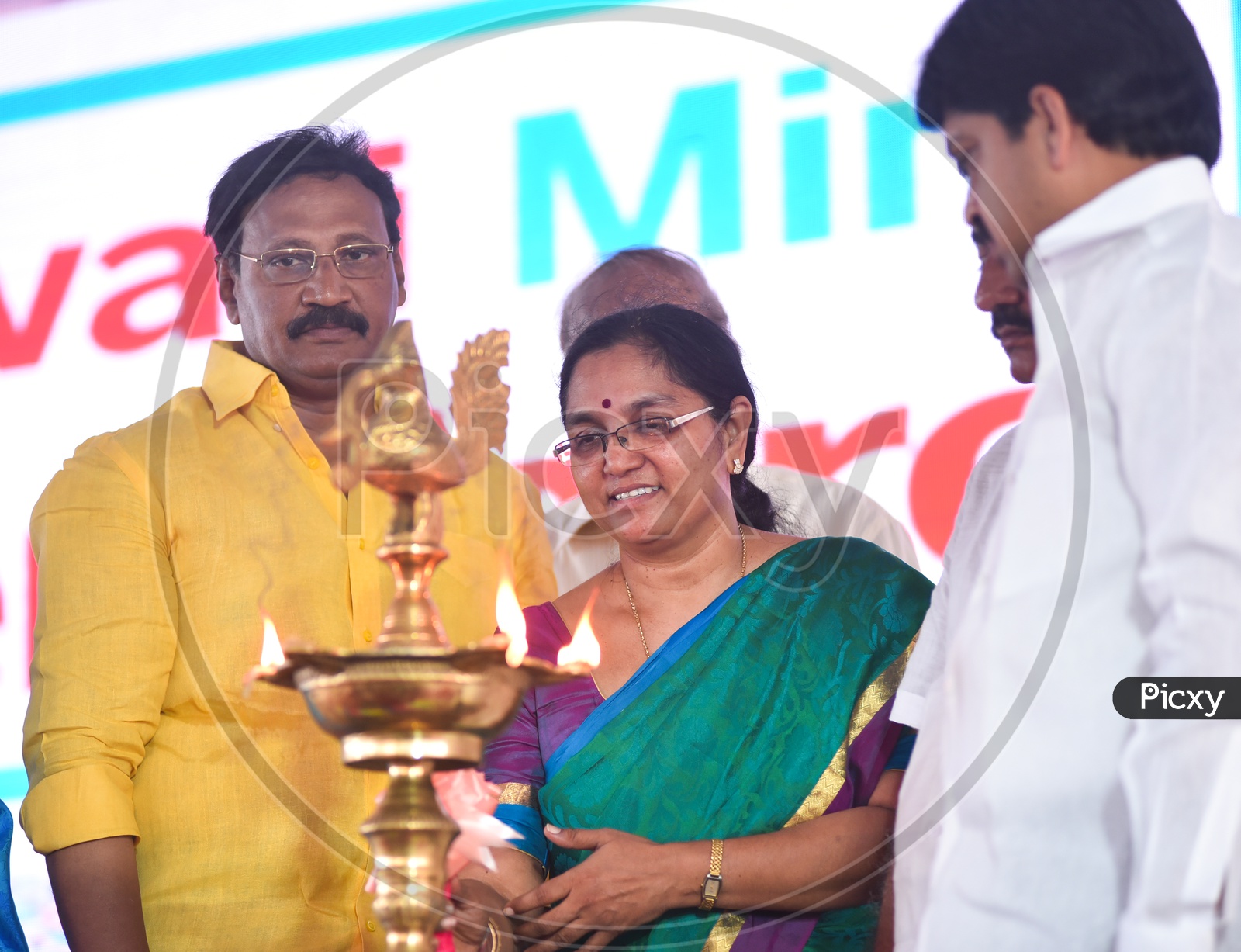 Image of Gadde Ram Mohan,MLA Vijayawada and APIS Chairman Nalli Kumari ...