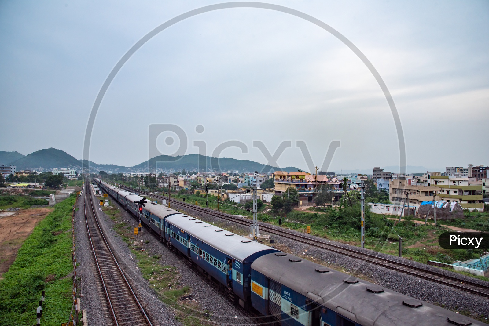Image of A train crossing the budameru bridge in Vijayawada-XW241376-Picxy