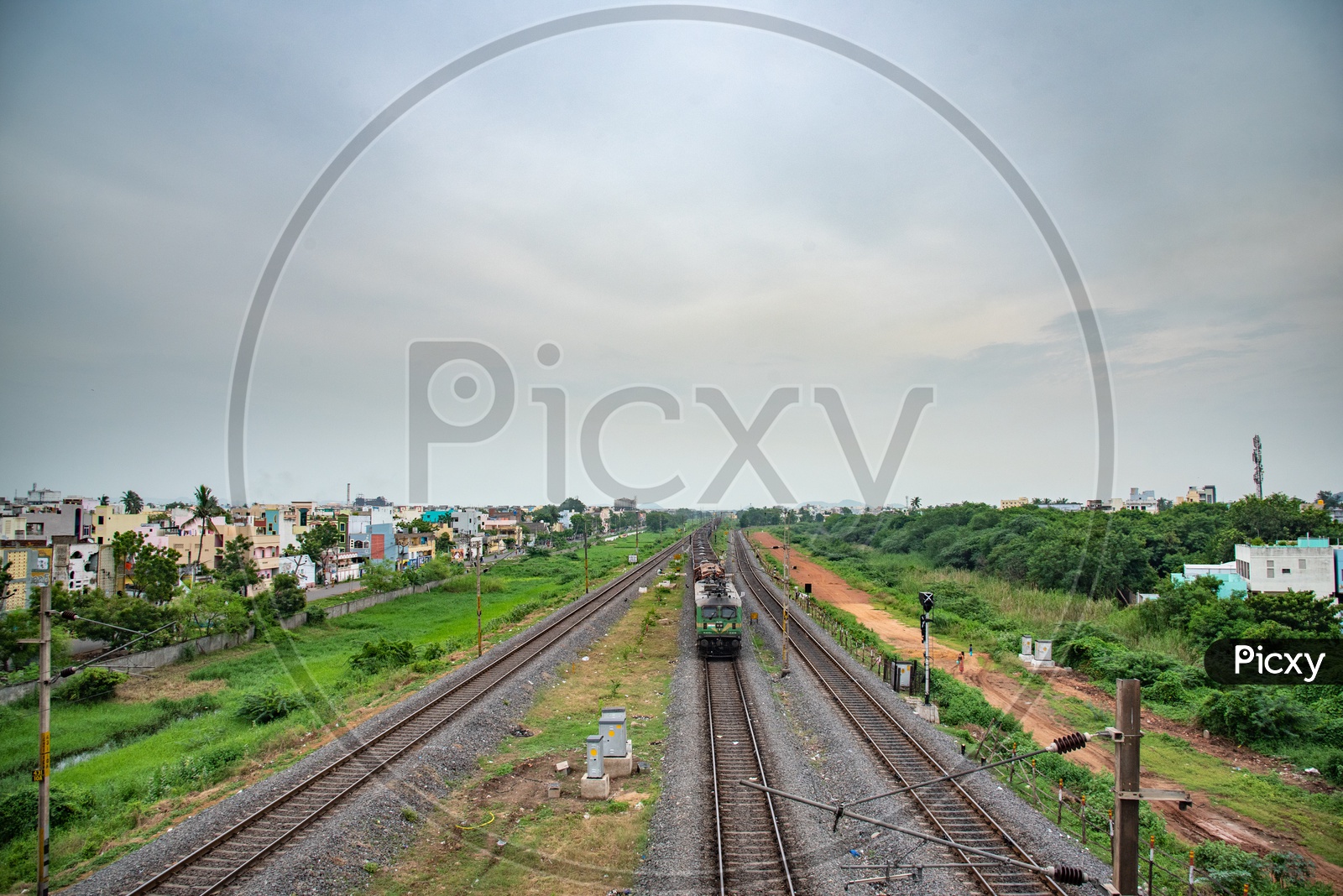 Image of a train approachin budameru bridge on Eluru-Vijayawada CHannel ...