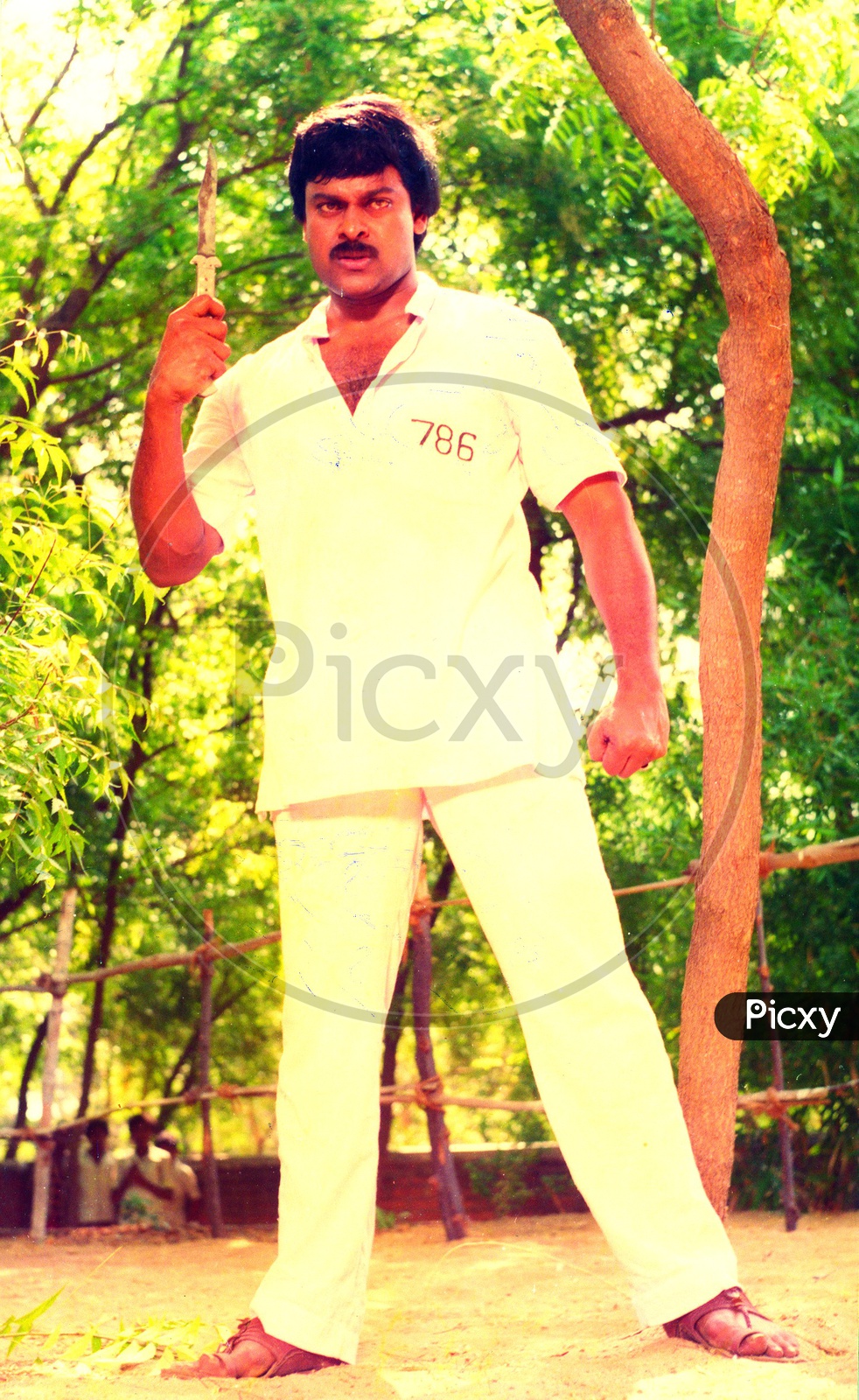 Image of Chiranjeevi working Still from Khaidi No. 786 Movie-GV771786-Picxy