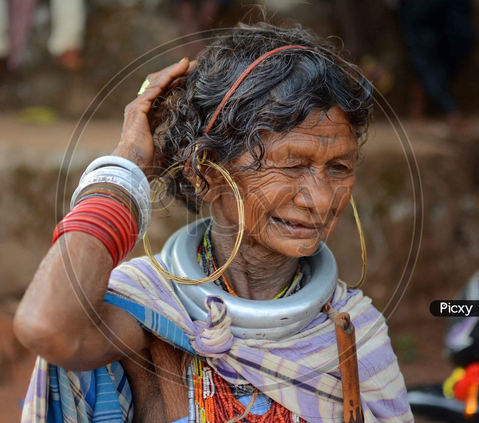 Image of Tribal Woman with Ear Piercings-HZ448590-Picxy