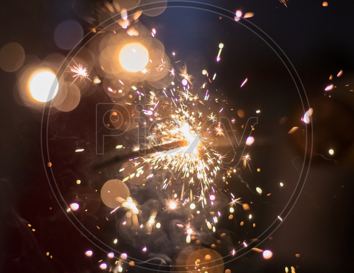 Image of A Beautiful Closeup Shot Of Diwali Crackers Firing-XN112410-Picxy