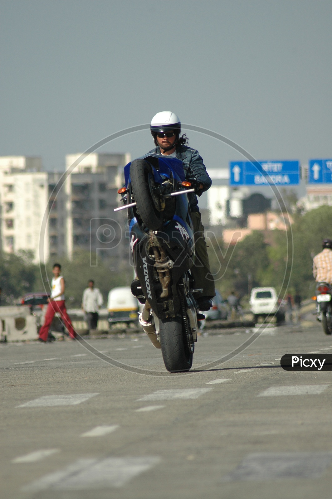 Image of Bike Stunts Performing By a Professional For a Movie Sequence ...