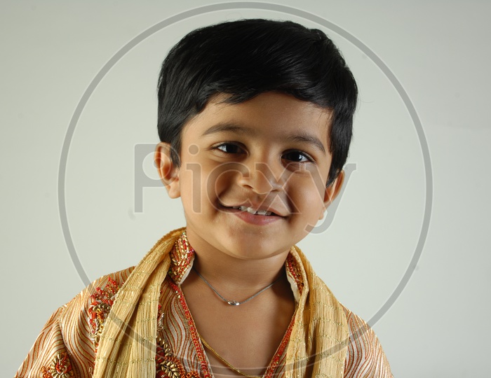 Image of Indian Boy in Traditional Clothes With a Smiling Face Over an ...