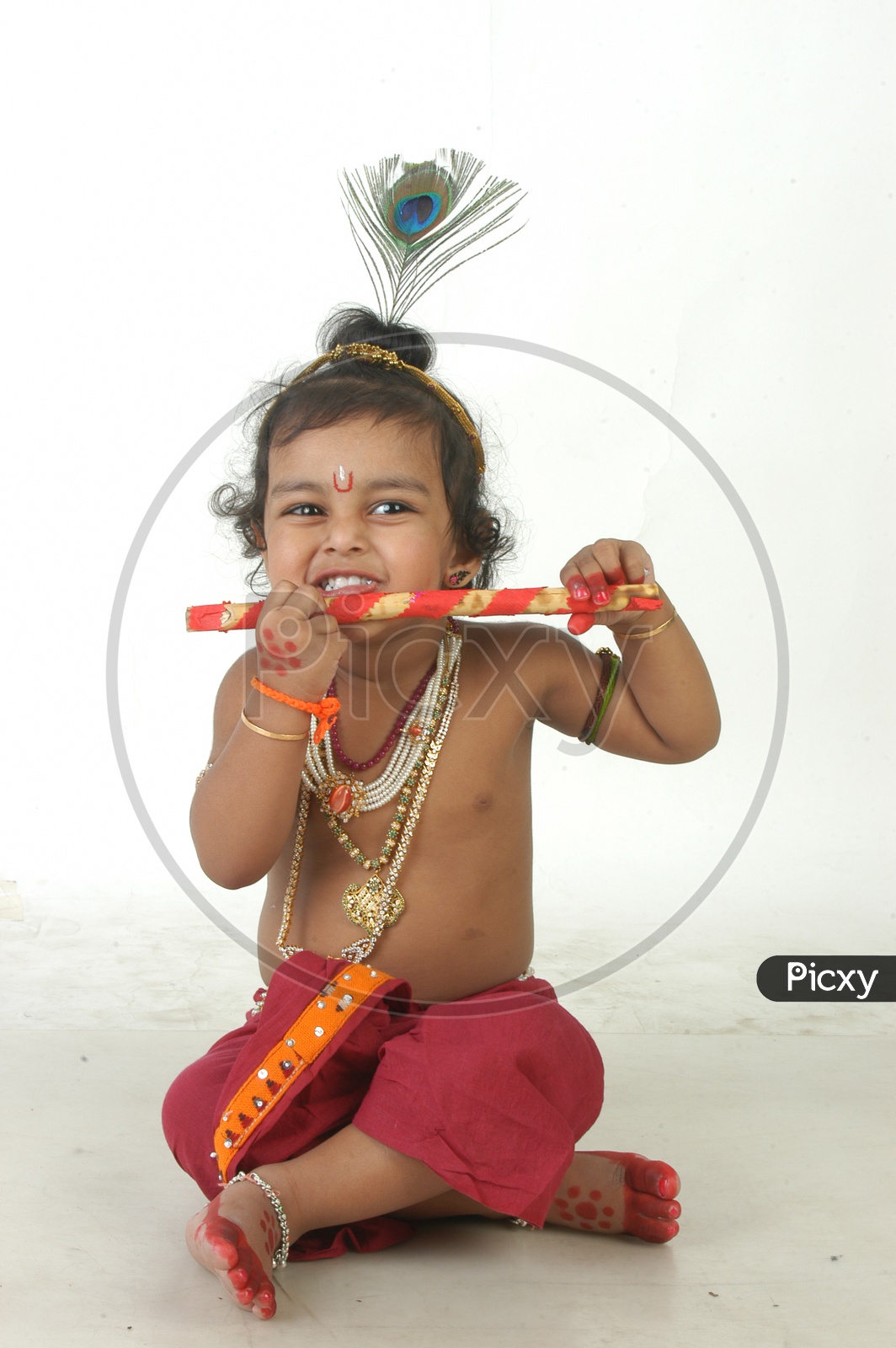 Image of A Cute Indian Boy in a Hindu God Sri Krishna Getup-KH074774-Picxy