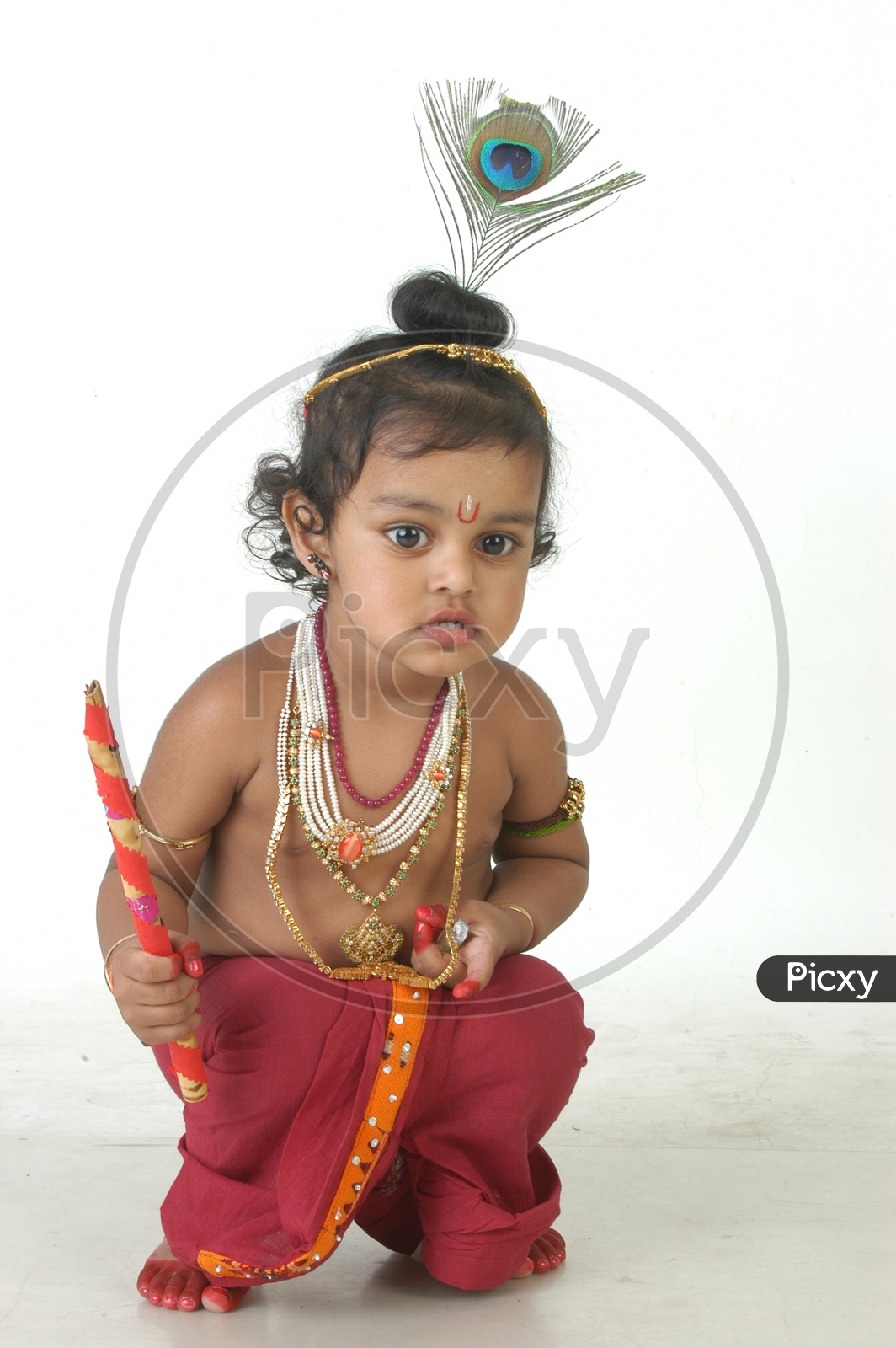Image of A Cute Indian Boy in a Hindu God Sri Krishna Getup-NL613064-Picxy
